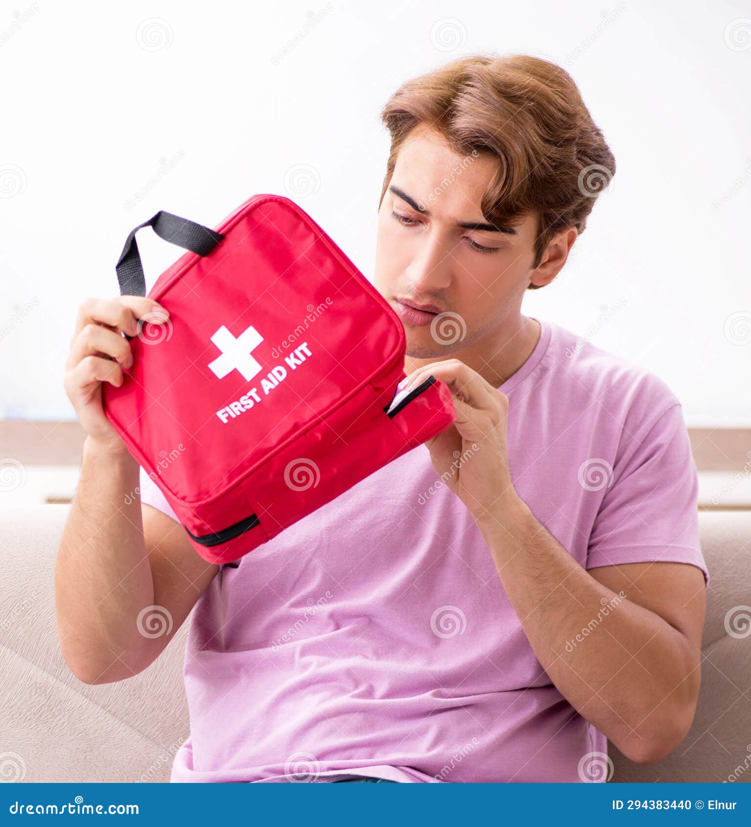 Sick Man at Home with First Aid Kit Stock Photo - Image of couch ...