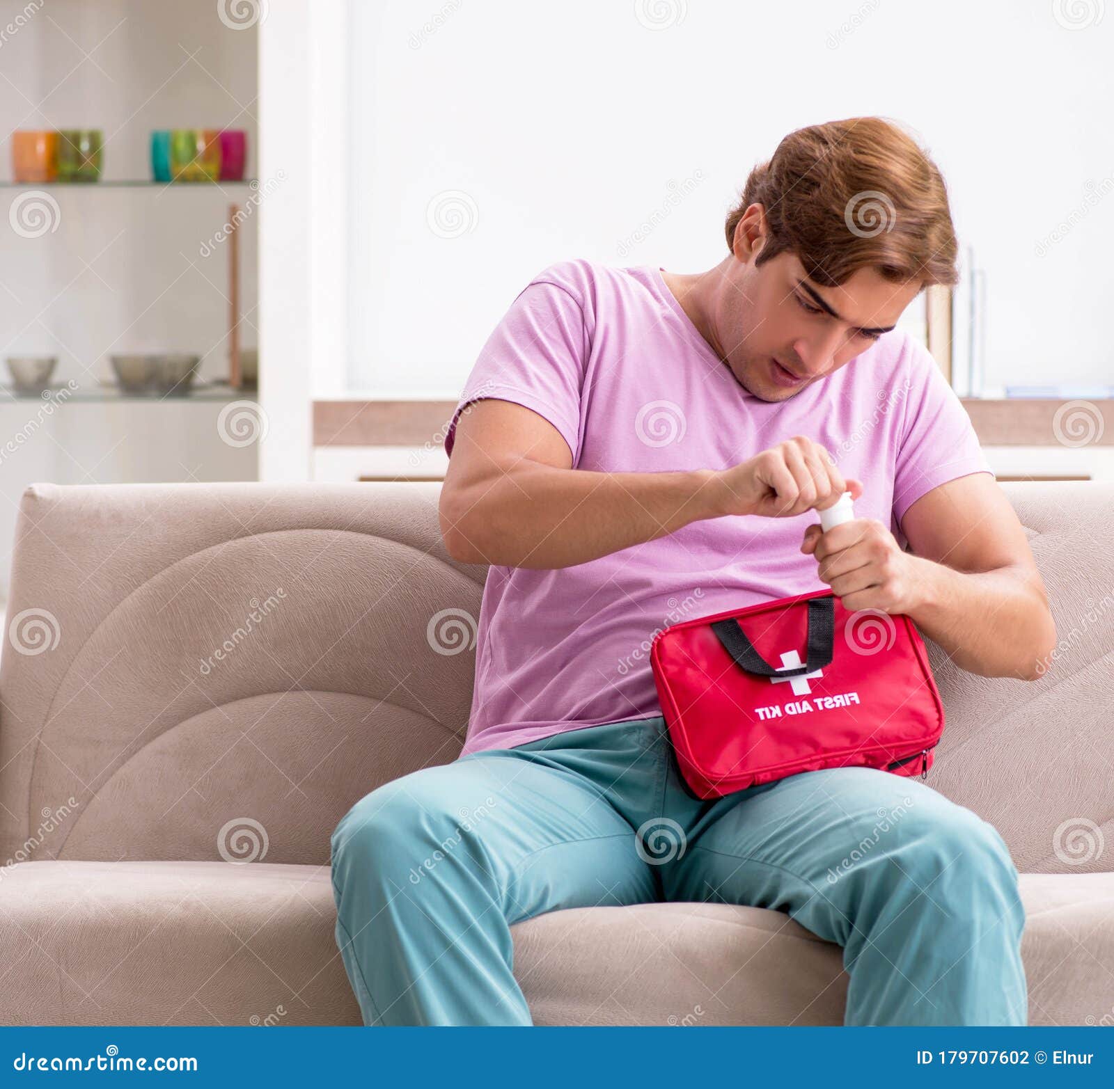 Sick Man at Home with First Aid Kit Stock Photo - Image of home, injury ...