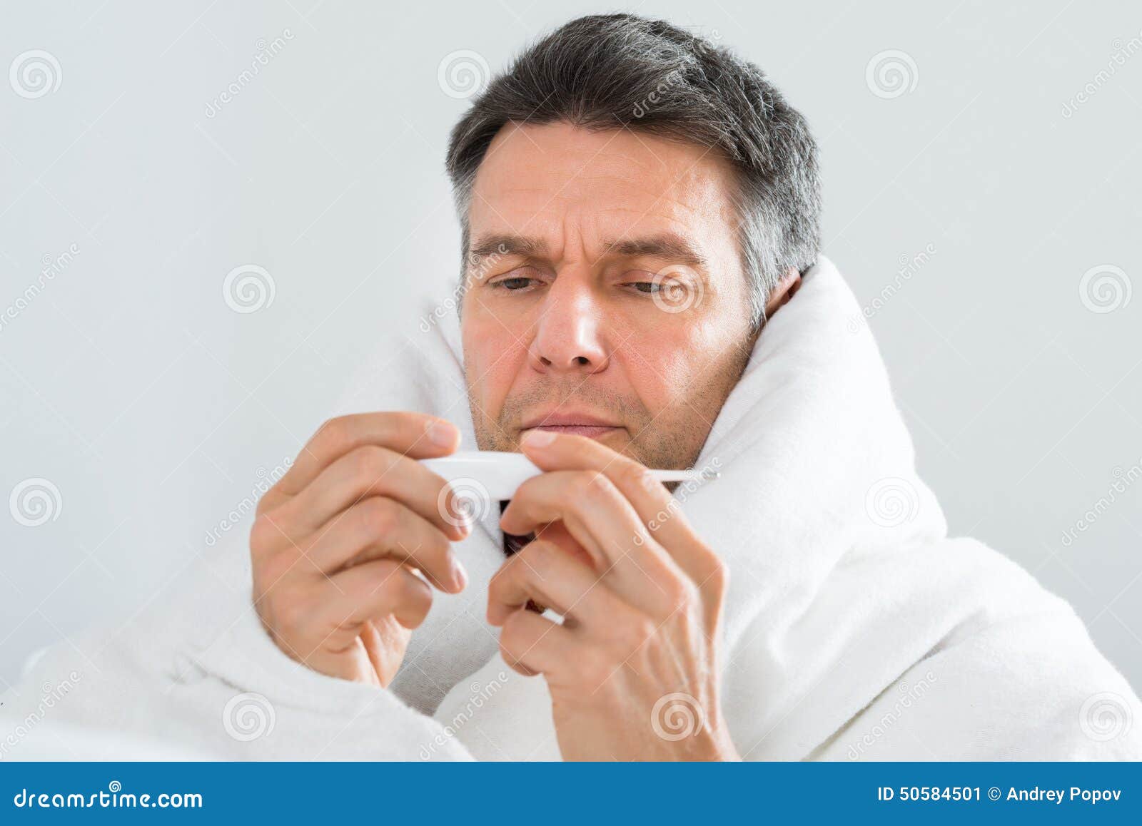 Sick Man Looking at Thermometer Stock Image - Image of person, illness ...