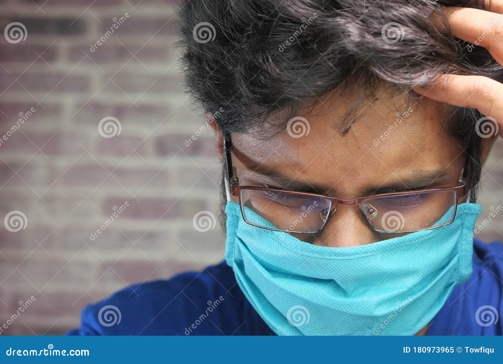 A Sick Man with a Mask on His Face Looking Down Stock Image - Image of ...