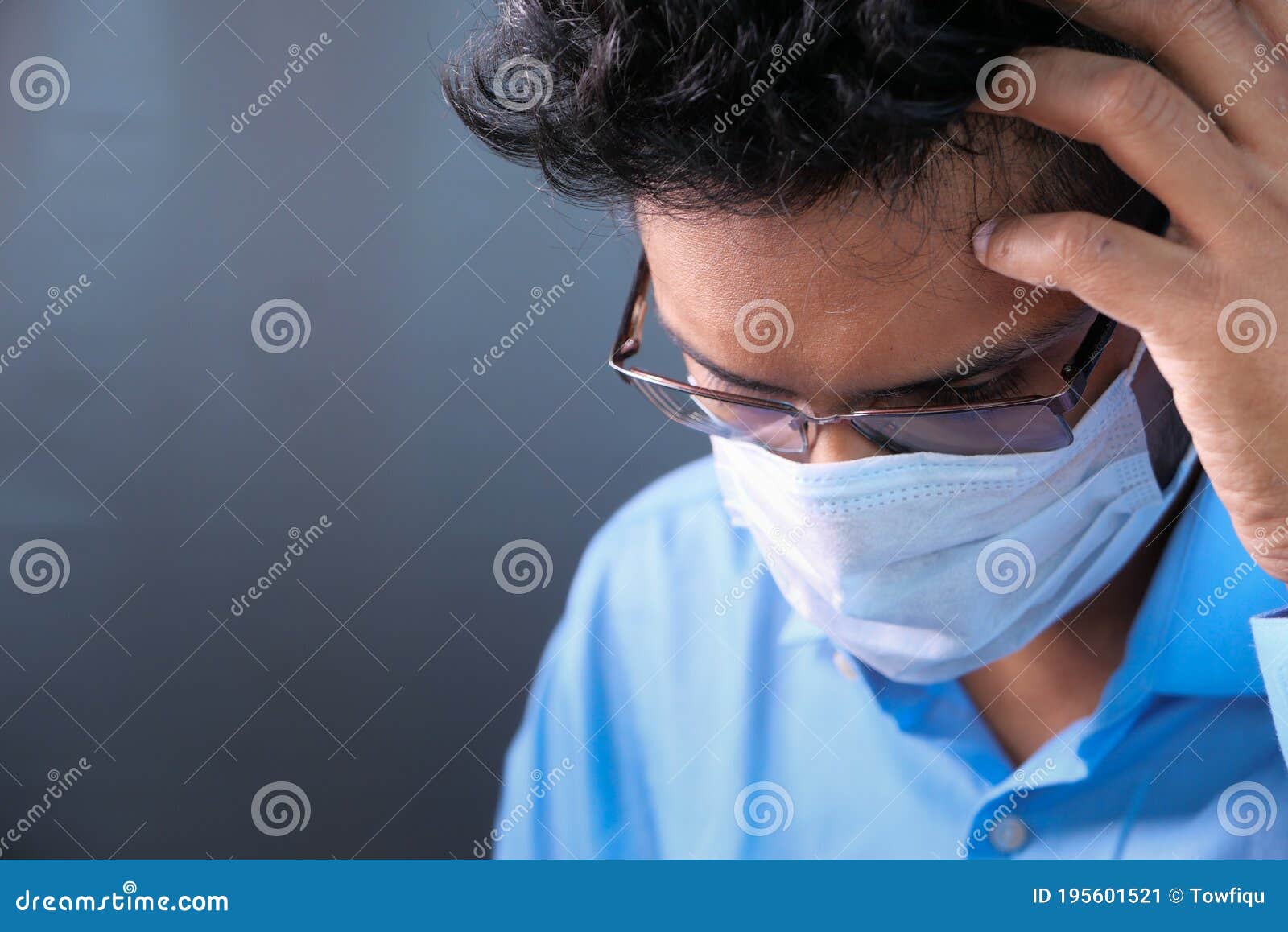 A Sick Man with Protective Mask in Face Looking Down Stock Image ...