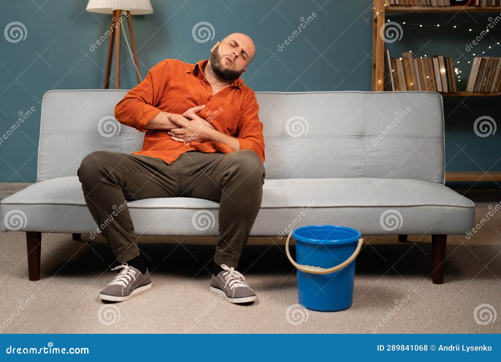 Sick Man Suffering from Sick Stomach and Vomiting at Home on the Couch ...