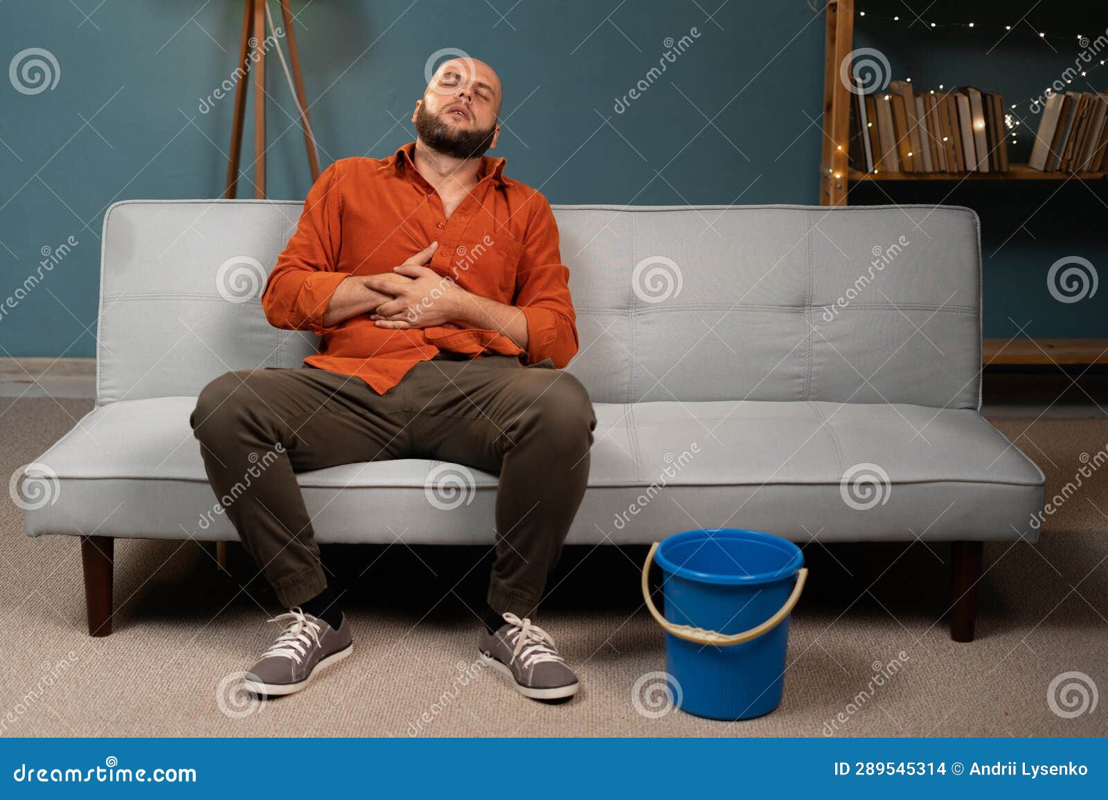 Sick Man Suffering from Sick Stomach and Vomiting at Home on the Couch ...