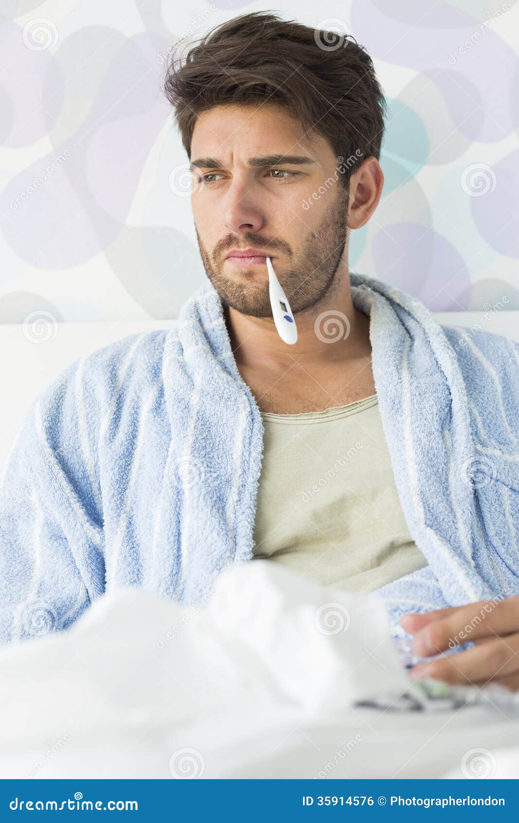 Sick Man with Thermometer in Mouth Sitting on Bed Stock Photo - Image of ethnicity, expression ...