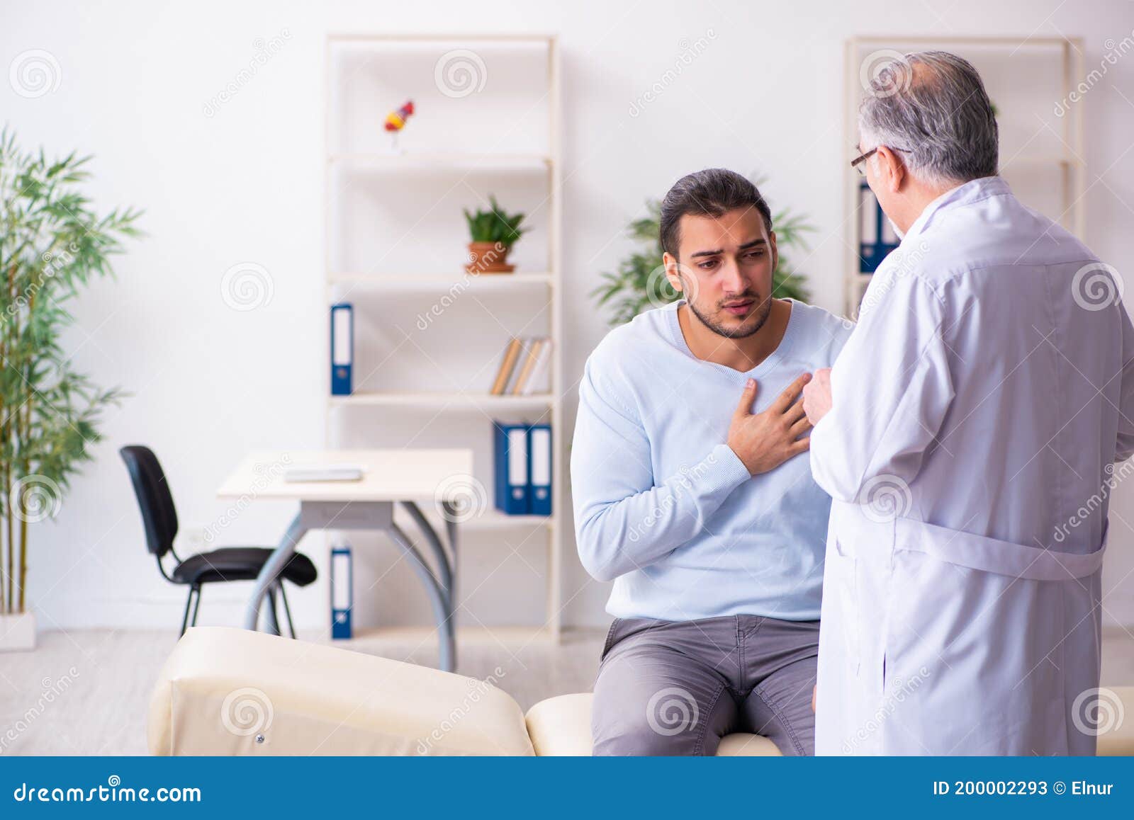 Young Sick Man Visiting Old Doctor Stock Image - Image of pain, chest ...