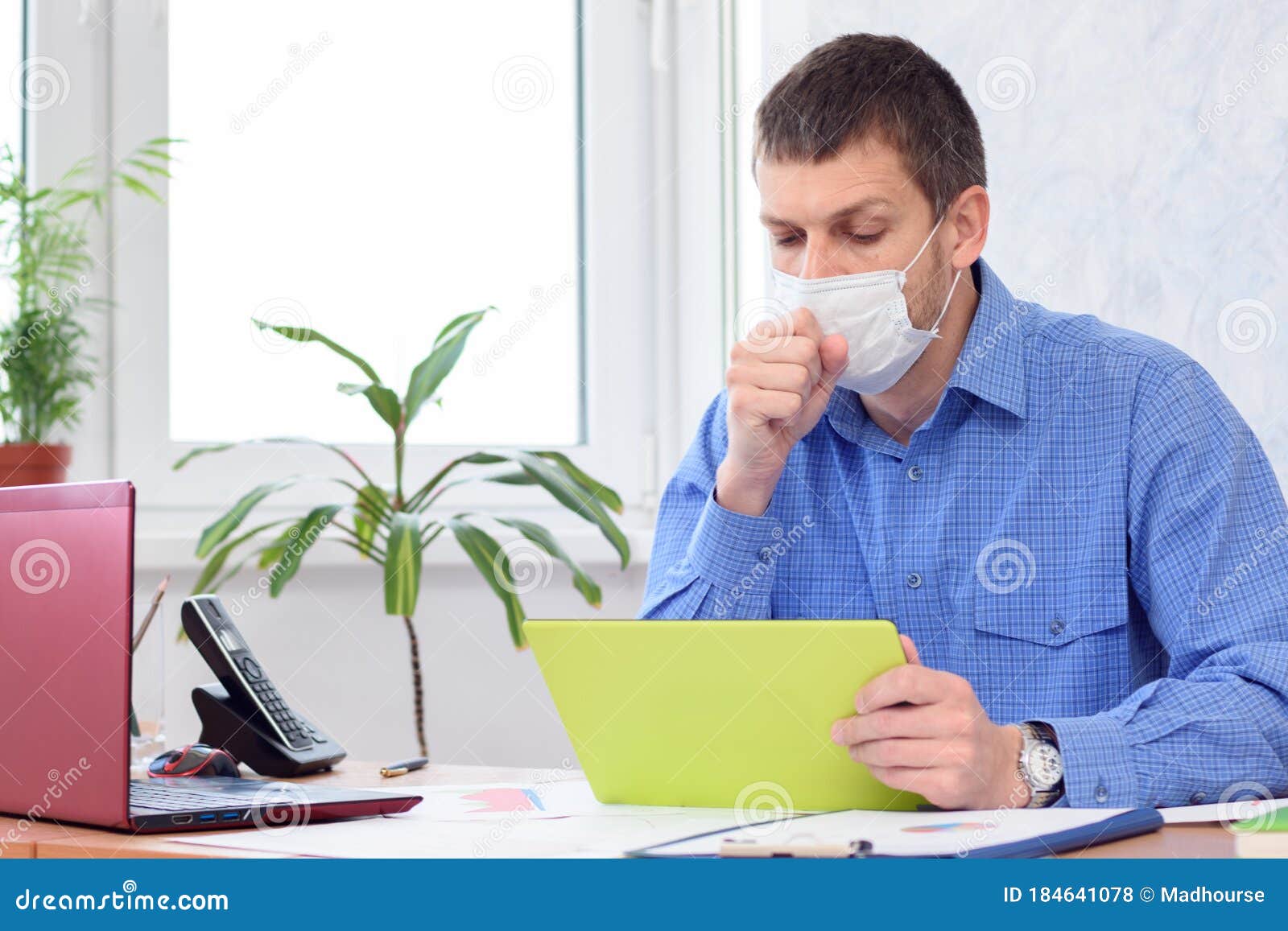 Sick Office Worker in Medical Mask Sits at Desk Stock Photo - Image of ...