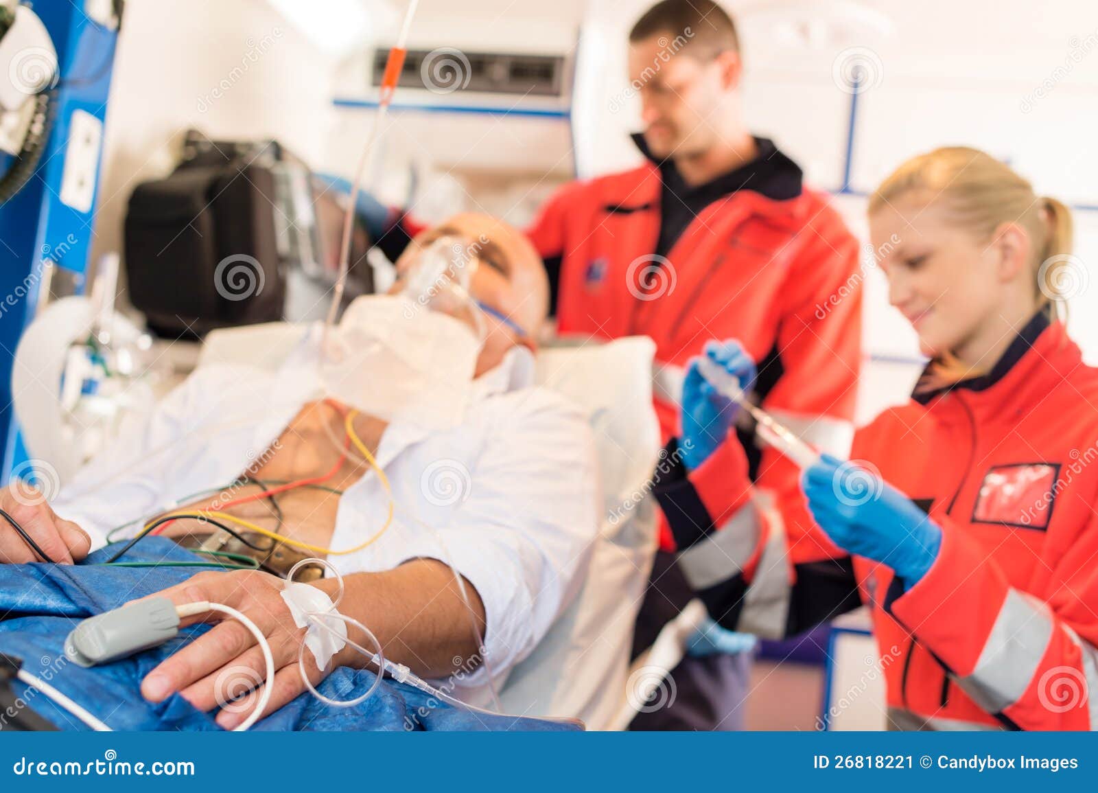 Sick Patient With Paramedic In Ambulance Treatment Stock Photo ...