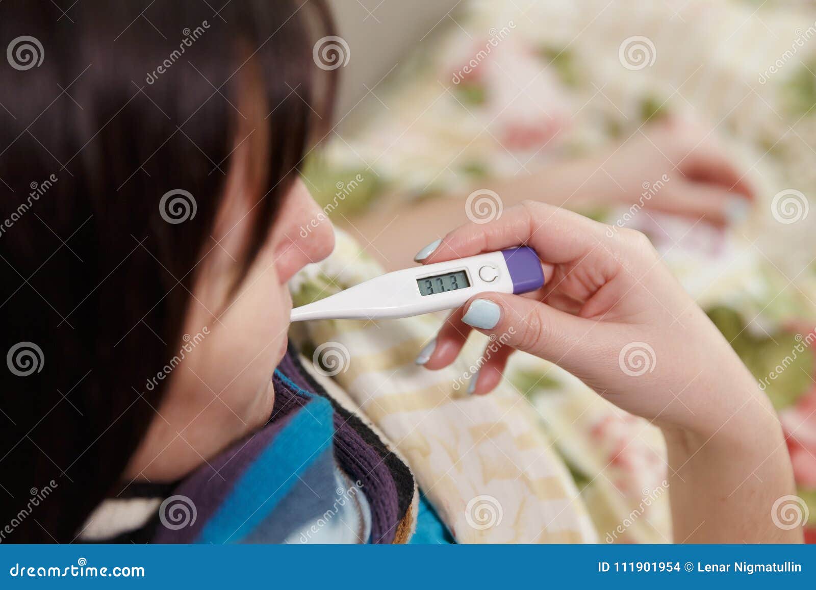 Sick Woman Measures Her Body Temperature with a Thermometer Stock Photo ...