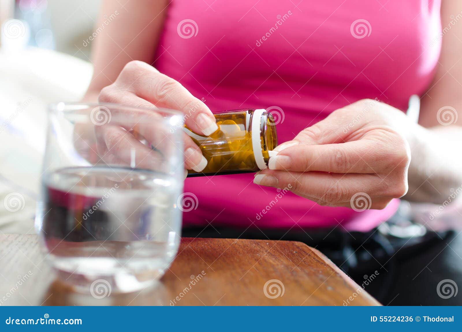 Sick woman taking drugs stock photo. Image of taking - 55224236