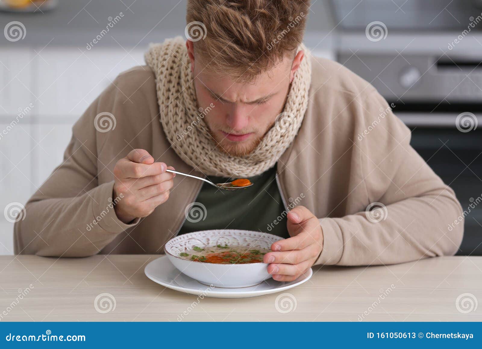 Sick Young Man Eating Soup To Cure Flu at Table Stock Image - Image of ...