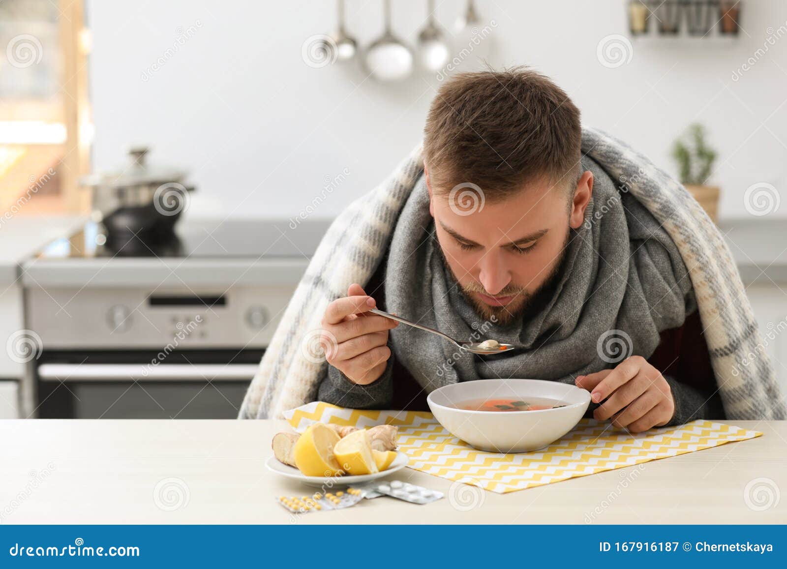 Sick Young Man Eating Tasty Soup To Cure Flu at Table Stock Image ... Sick Young Man Eating Tasty Soup To Cure Flu at Table Stock Image ...