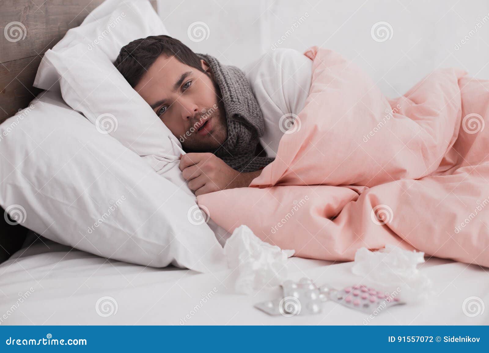 Sick Young Man Fever Concept Stock Photo - Image of lying, infection ...
