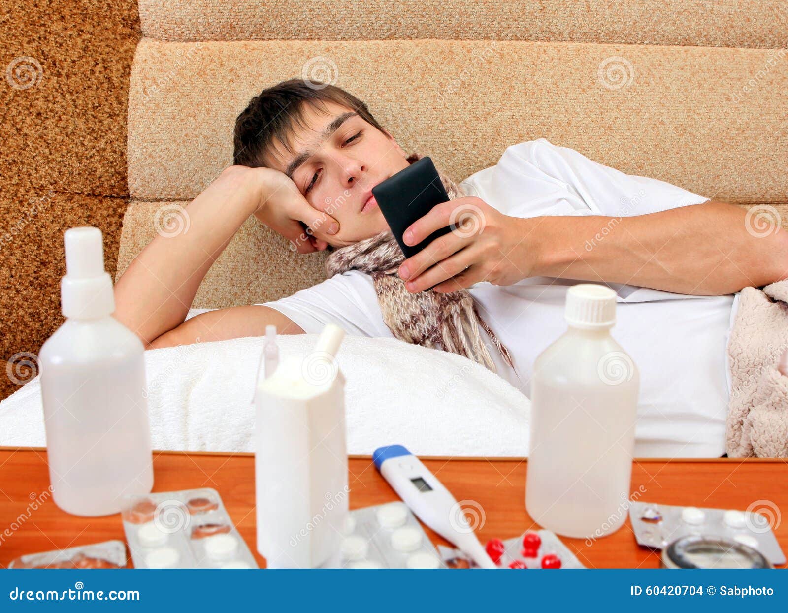 Sick Young Man with the Phone Stock Photo - Image of medicine, cold ...