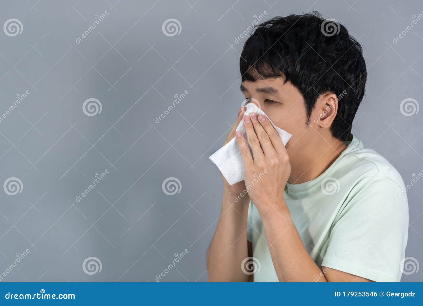 Sick man is sneezing stock photo. Image of covid19, influenza - 179253546