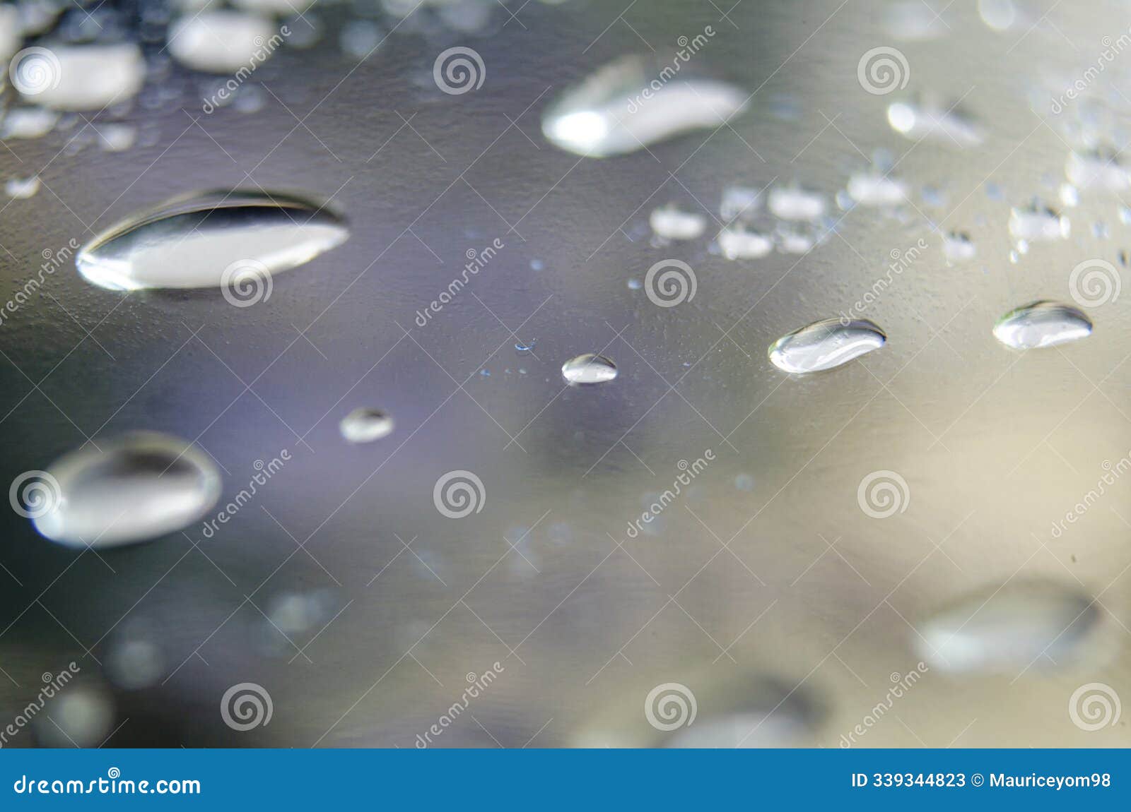 Side Angle of Clear Raindrops on a Transparent Surface. Rain ...