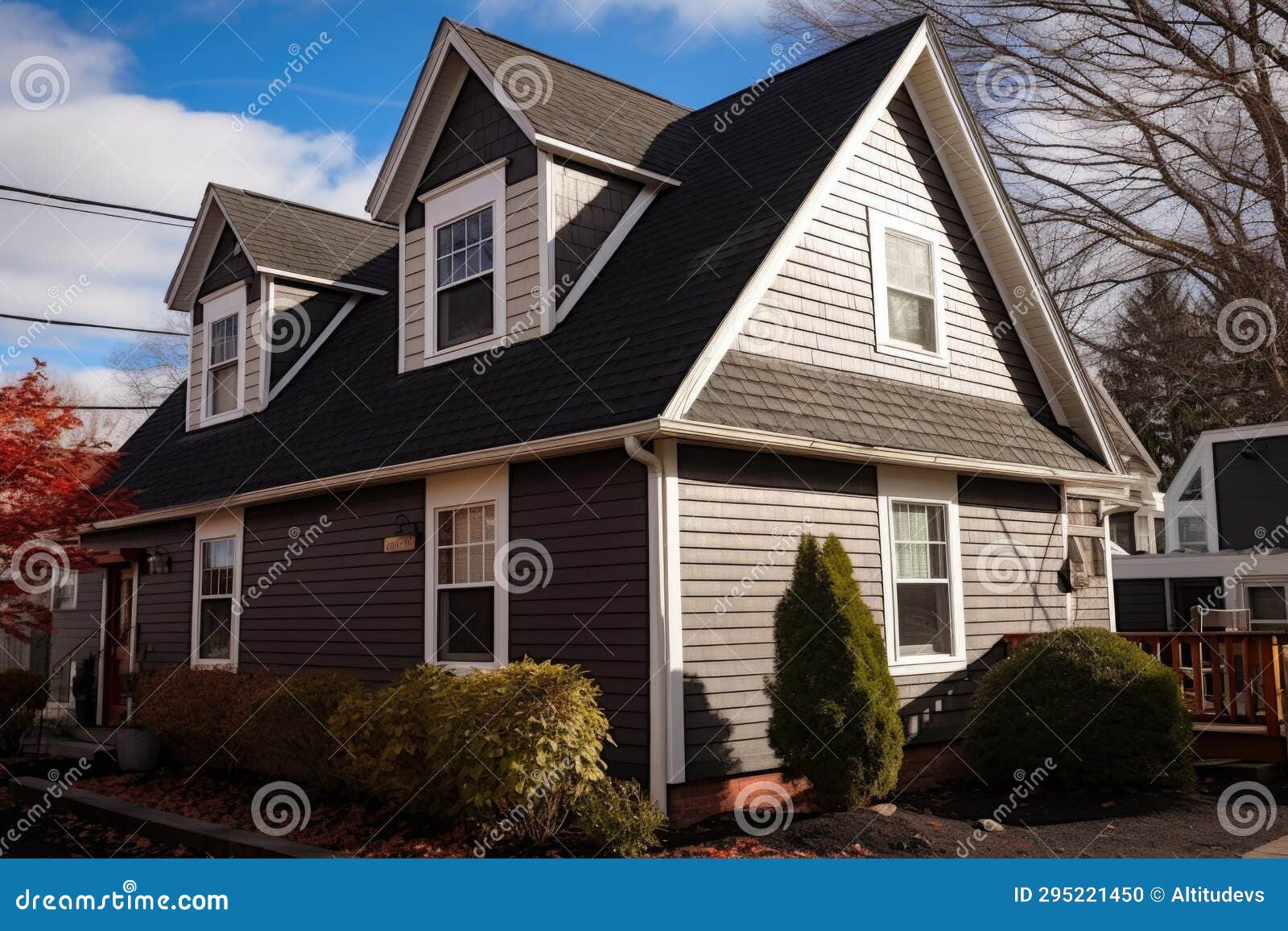 Side Angle of a Dutch Colonial Home Showcasing Dormer Windows Stock ...