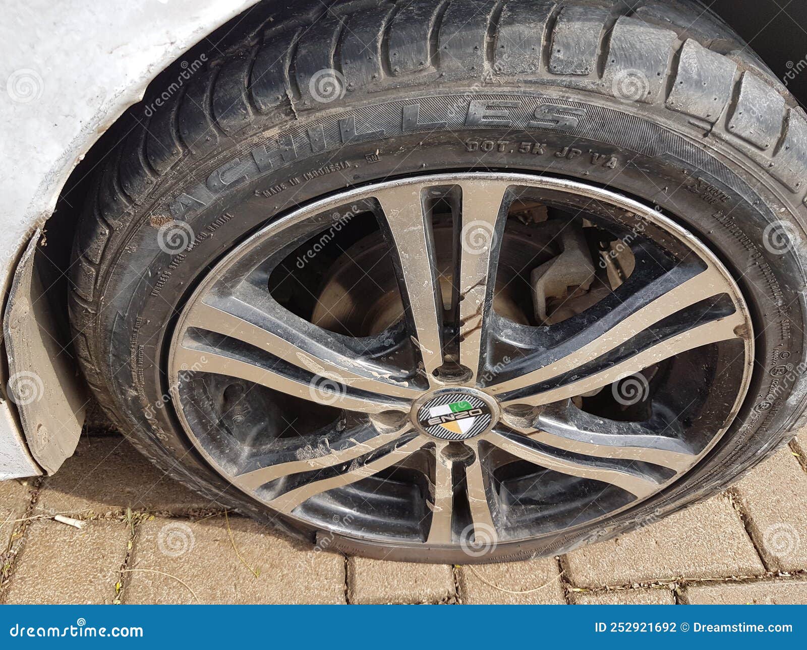 SIDE BROKEN TYRE editorial photography. Image of side - 252921692