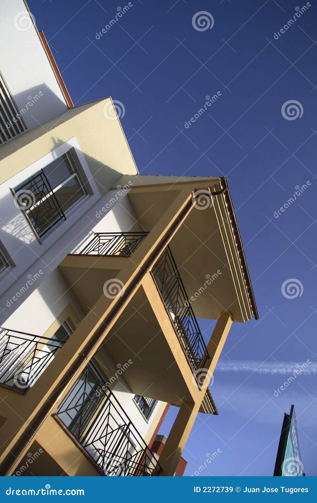 Side of Building with Balcony Stock Image - Image of patio, story: 2272739