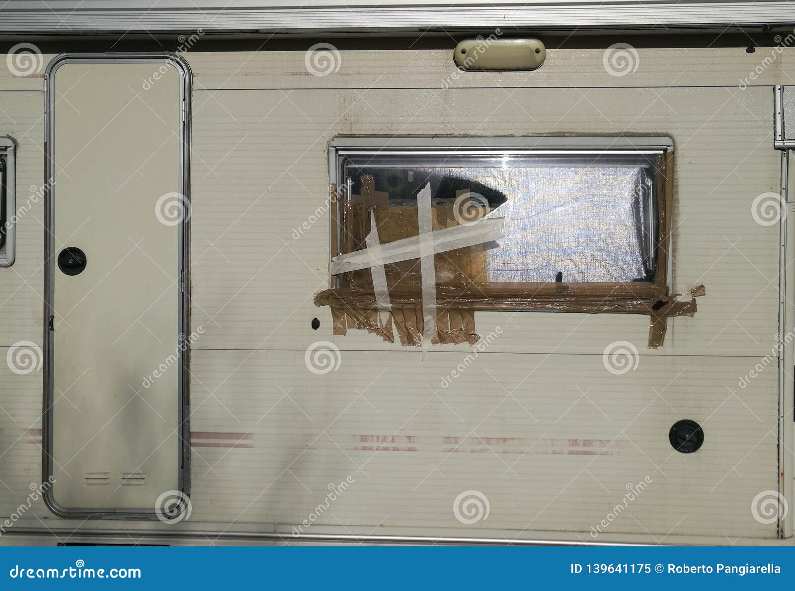 Side of a Caravan with a Broken Window Stock Image - Image of metal ...