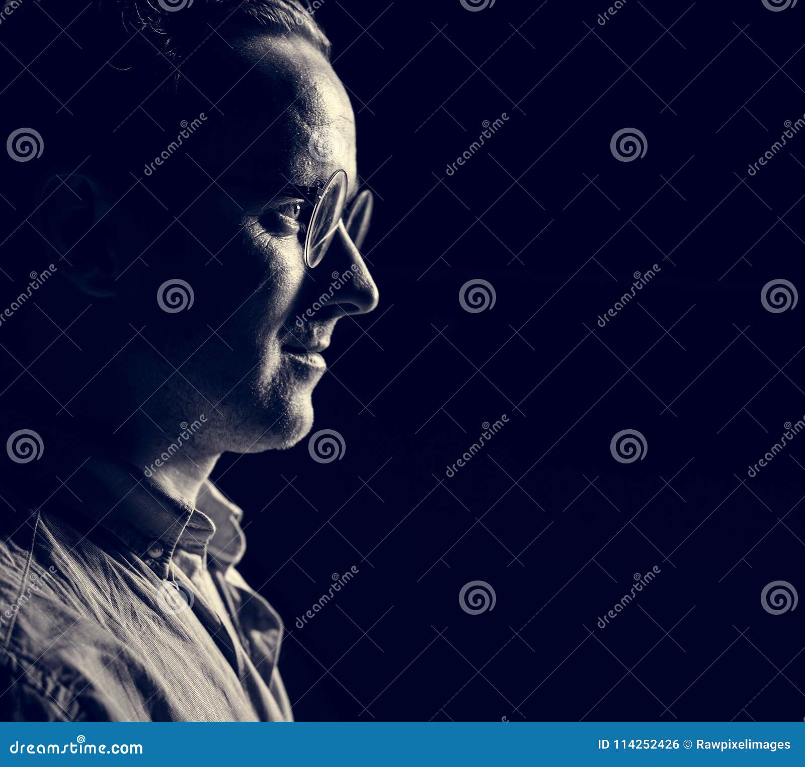 Side face of a serious man stock photo. Image of black - 114252426