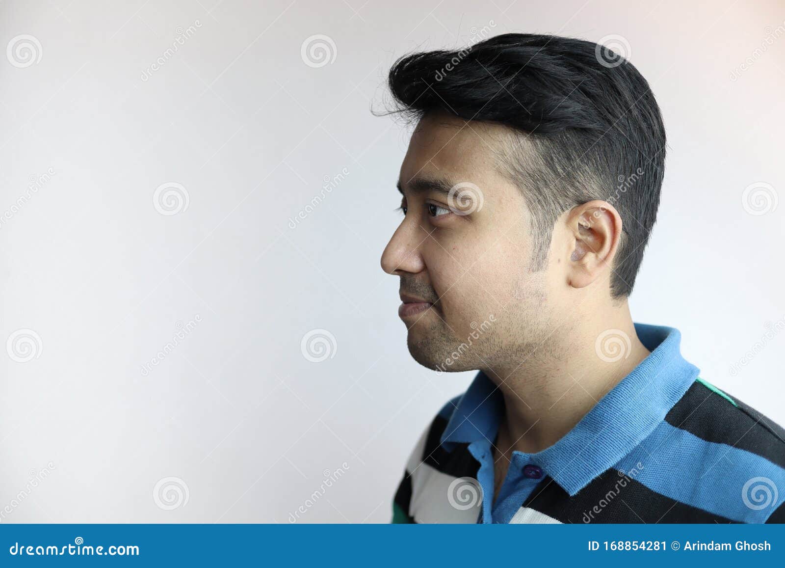 Side Face of a Young Indian Male Isolated in White Background with Copy ...