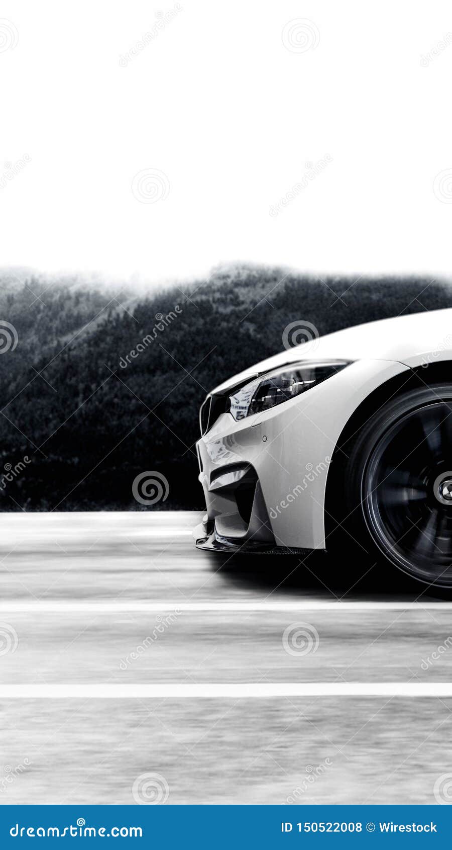 Side of the Front of a Fast White Sports Car on the Road Stock Photo ...