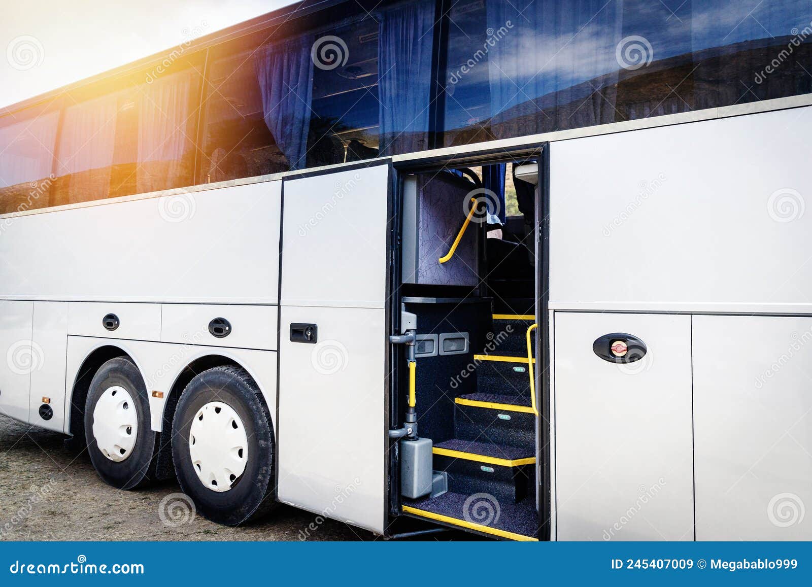 Side of a Large White Tourist Bus with an Open Door Stock Image - Image ...