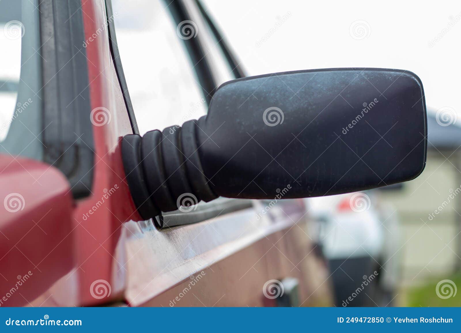 Side Left Black Plastic Rearview Mirror on a Red Car. Exterior Side ...