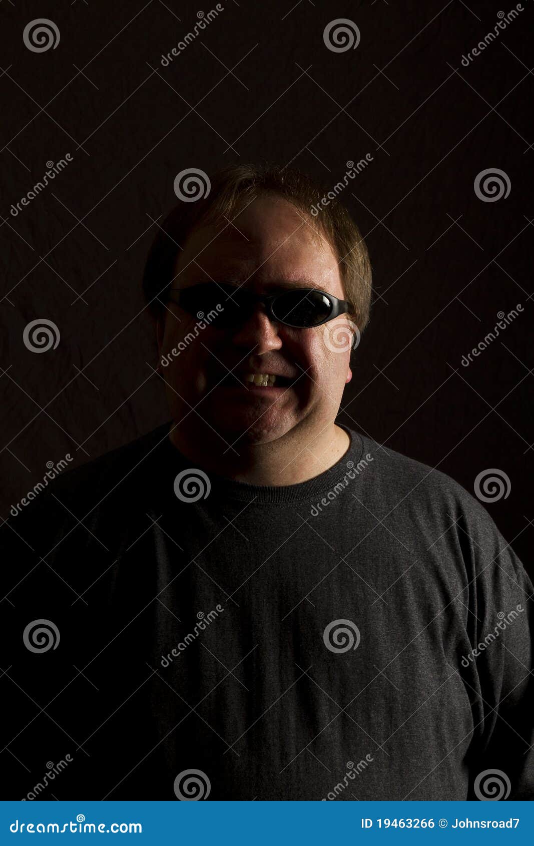 Side-lit Man Sunglasses stock photo. Image of concept - 19463266