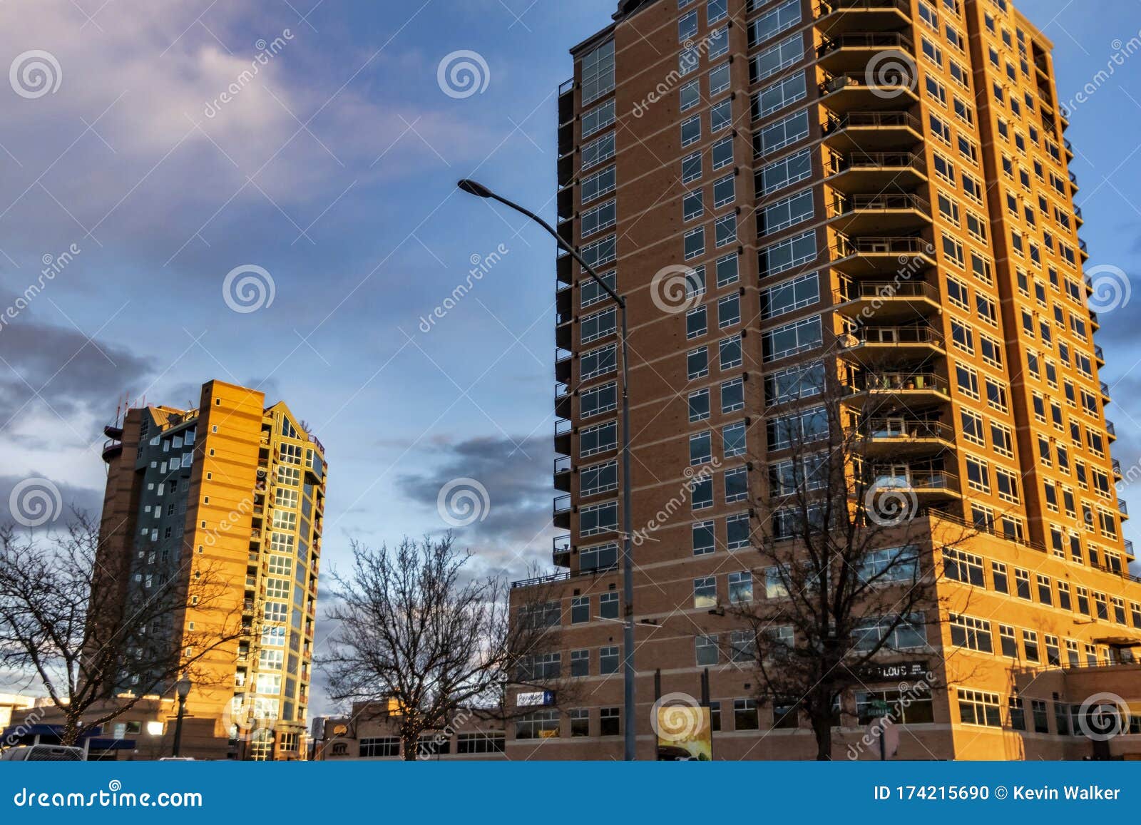Side Lit Tall Red Brick High Rise Building Stock Photo - Image of rooms ...