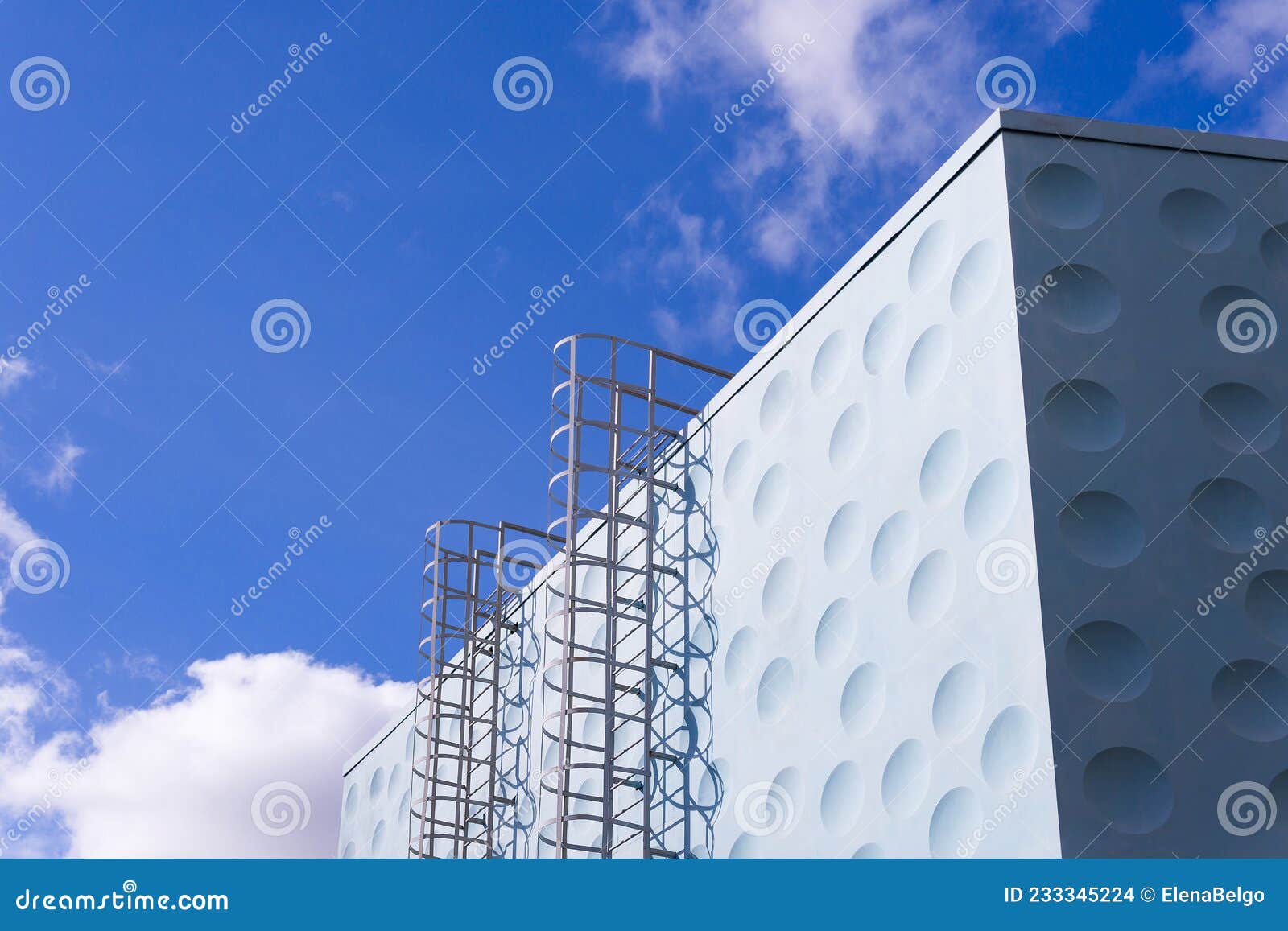The Side of the Modern Building with Two Fire Escape Ladders. Stock ...