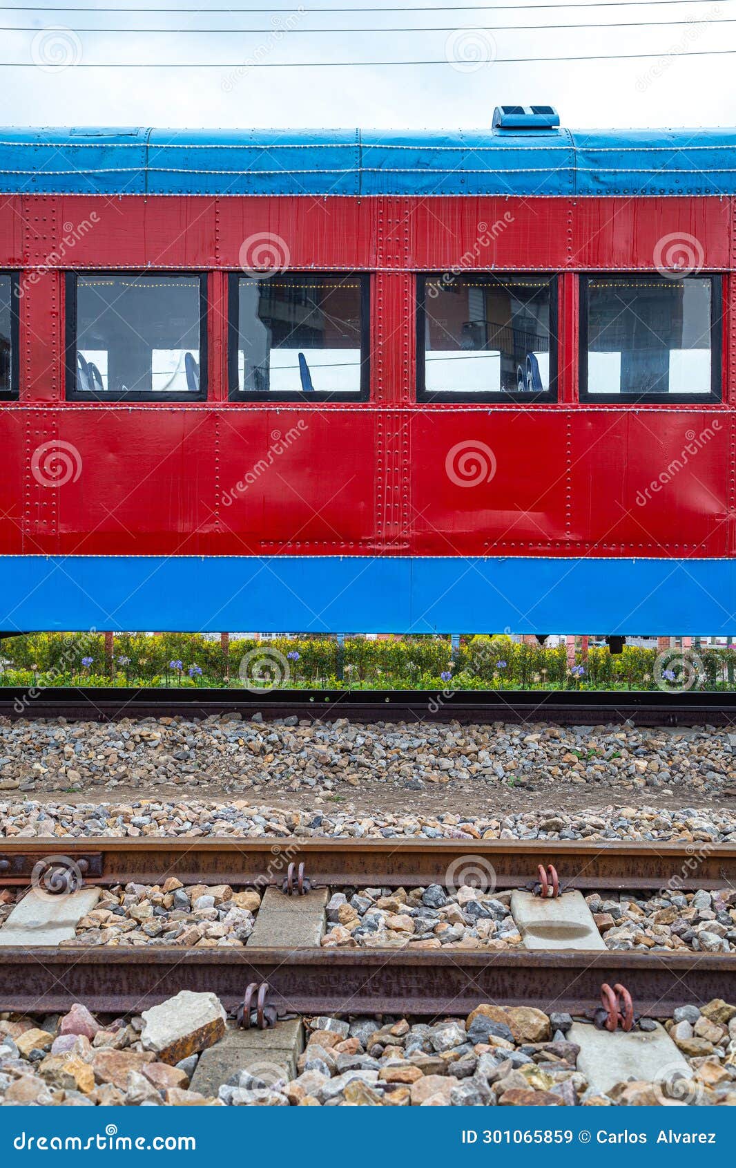 Side Photograph of an Old Colored Train on the Railroad Stock Image ...