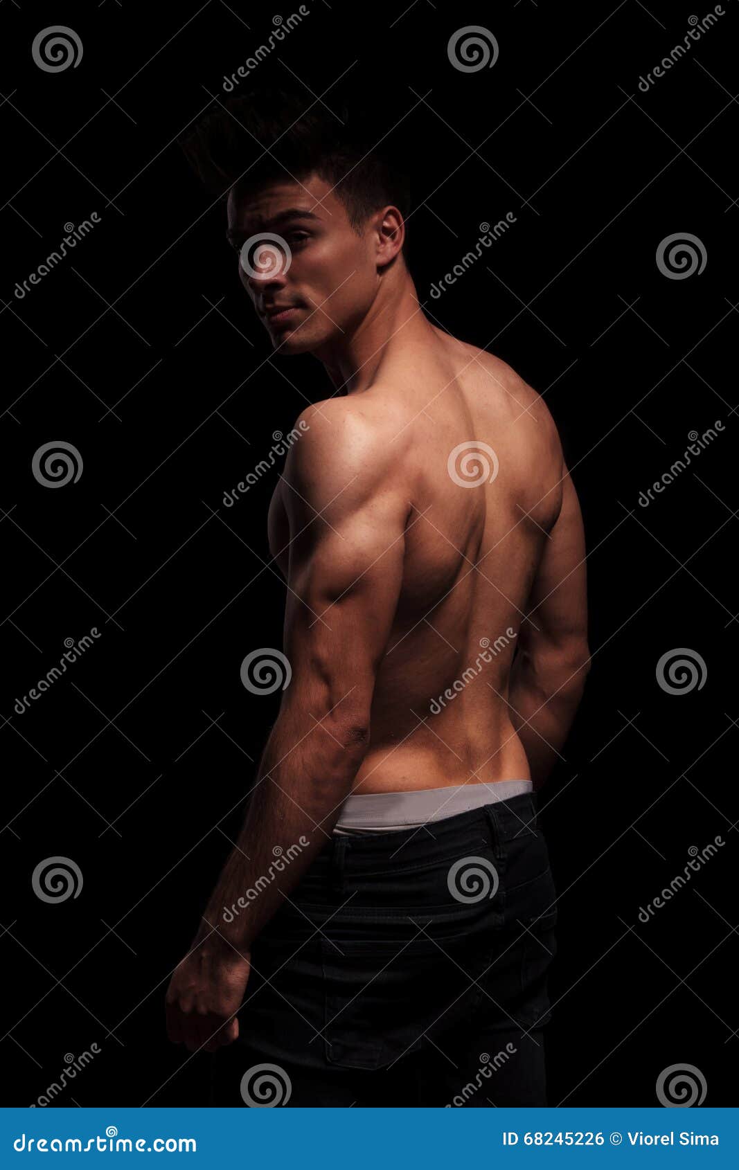 Side Portrait on Standing Muscular Man Stock Photo - Image of shoulders ...