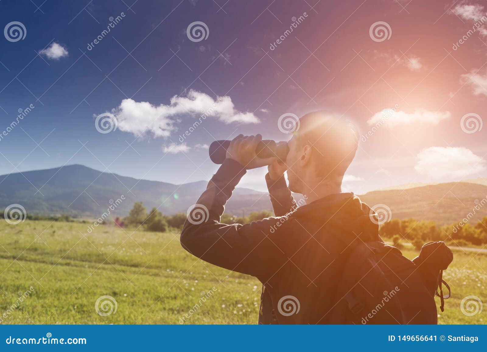 The Side Profile of Man Watching Though Binoculars Stock Image - Image ...