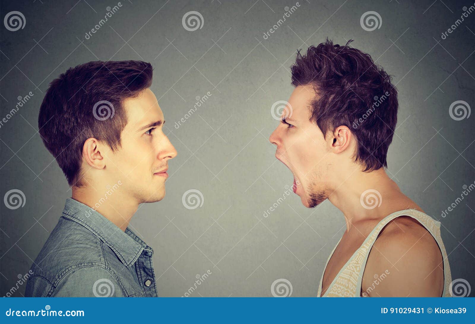 Side Profile Portrait of Young Angry Man Screaming at a Calm Smiling ... Side Profile Portrait of Young Angry Man Screaming at a Calm Smiling ...