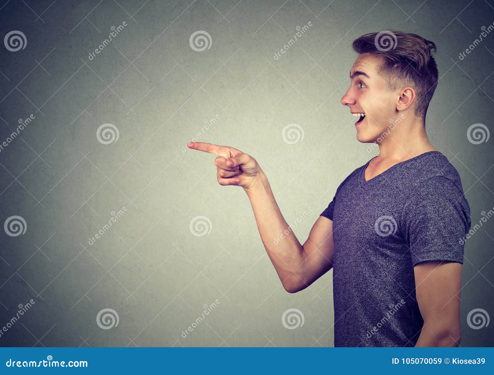Surprised Young Man Pointing Finger Stock Image - Image of caucasian ...