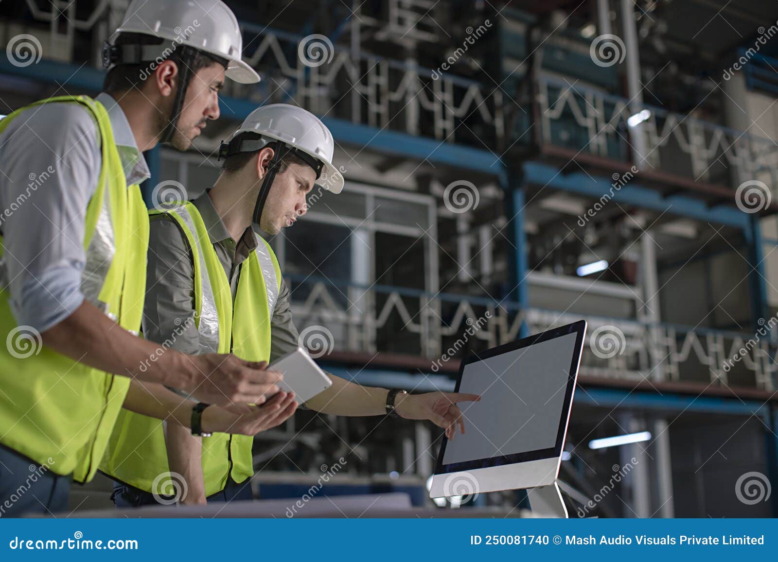 Side Profile of Two Male Technical Engineers Working on Digital Tablet ...