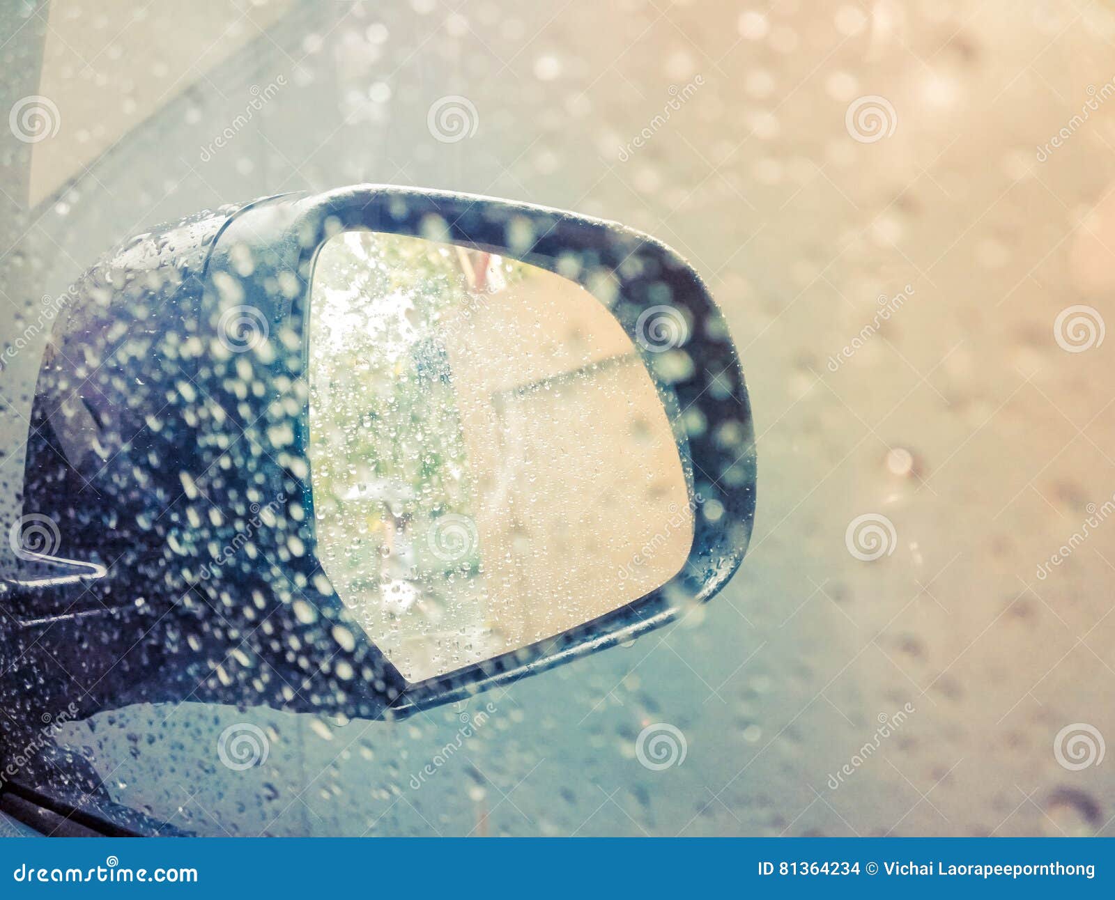 Side Rear-view Mirror on a Old Automobile with Raindrops on Glass Stock ...