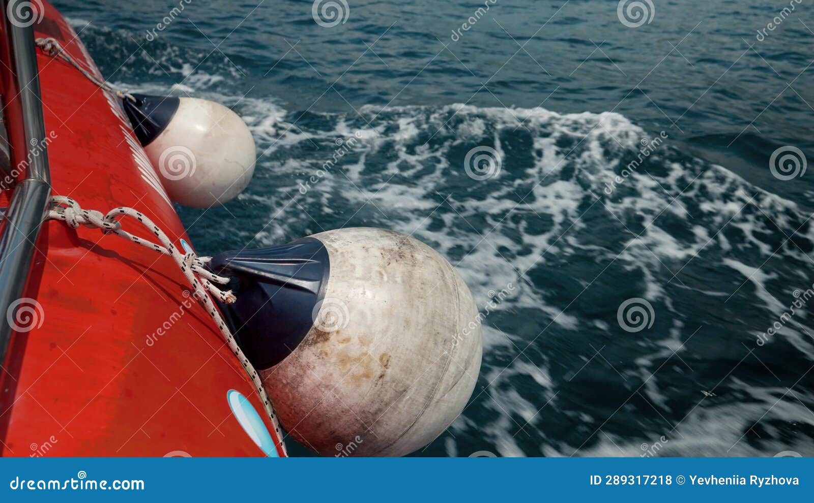 Side of the Red Life Saving Rescue Boat Sailing in Cold Ocean Waves ...