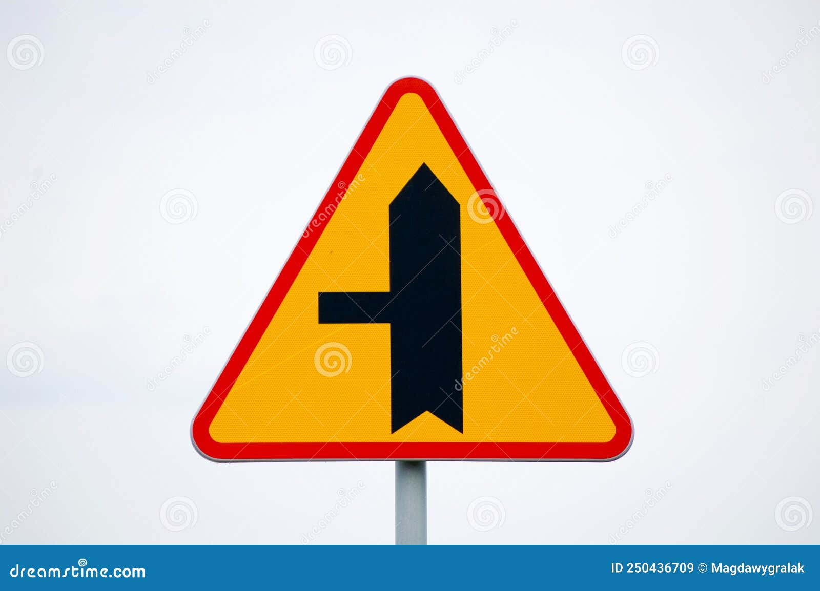 Side Road Warning Sign Against Blue Sky. Stock Image - Image of ...