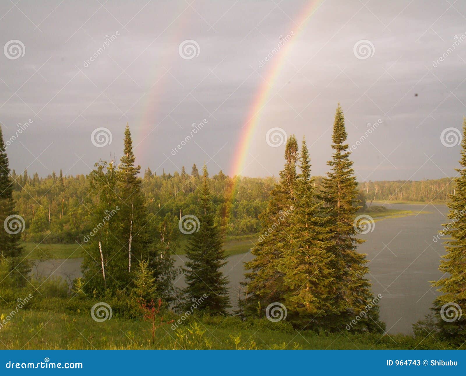 Side by side rainbows stock image. Image of rainbows, lake - 964743
