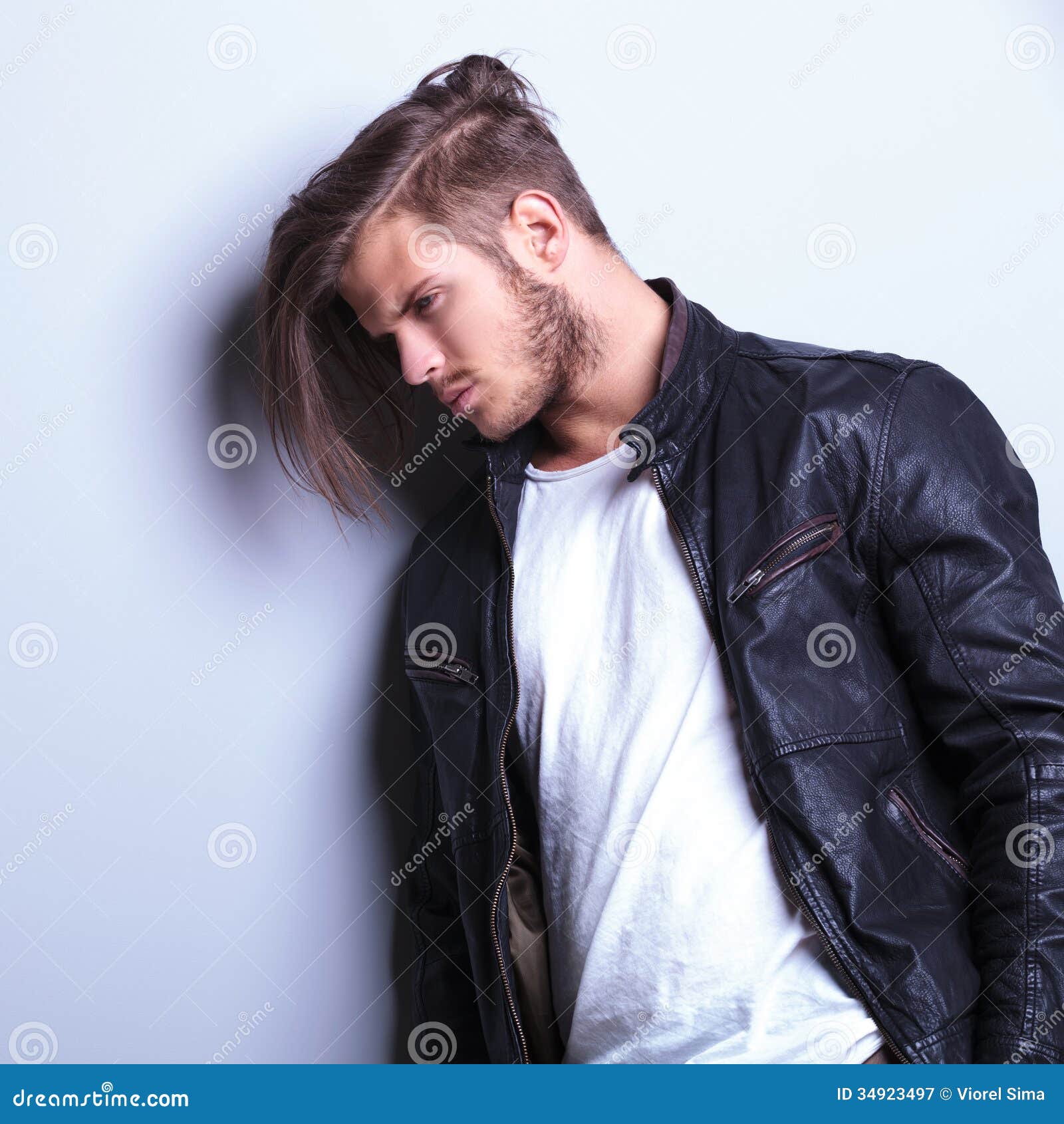 Side of a Thoughtful Young Man in Leather Jacket Stock Image - Image of ...