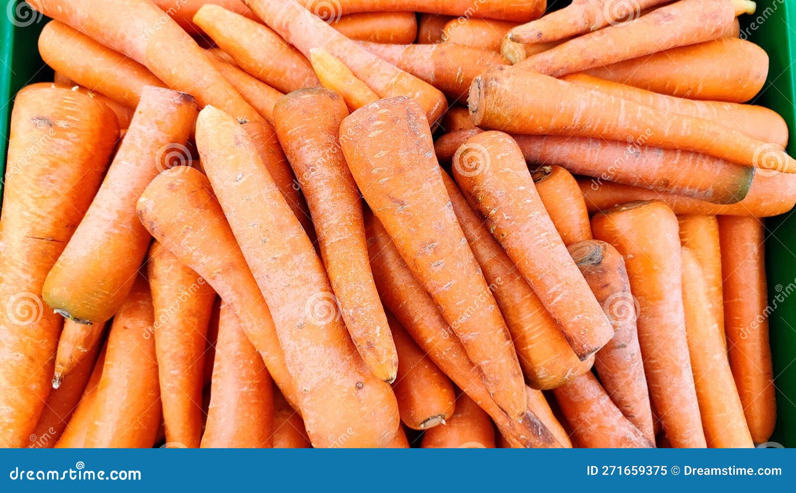A Close Up View of the Piling Small Long Carrots Stock Image - Image of ...