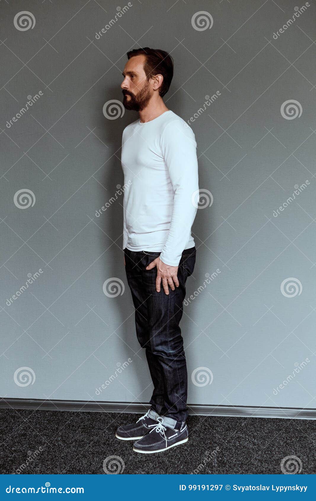 Side View of an Actor Standing on Grey Backdrop. Stock Image - Image of ...