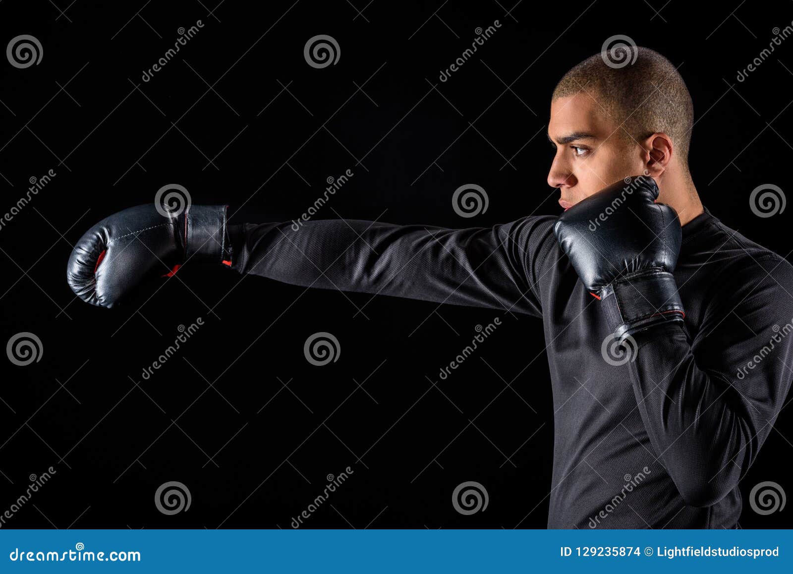 Side View of African American Boxer Making Hit Stock Photo - Image of ...