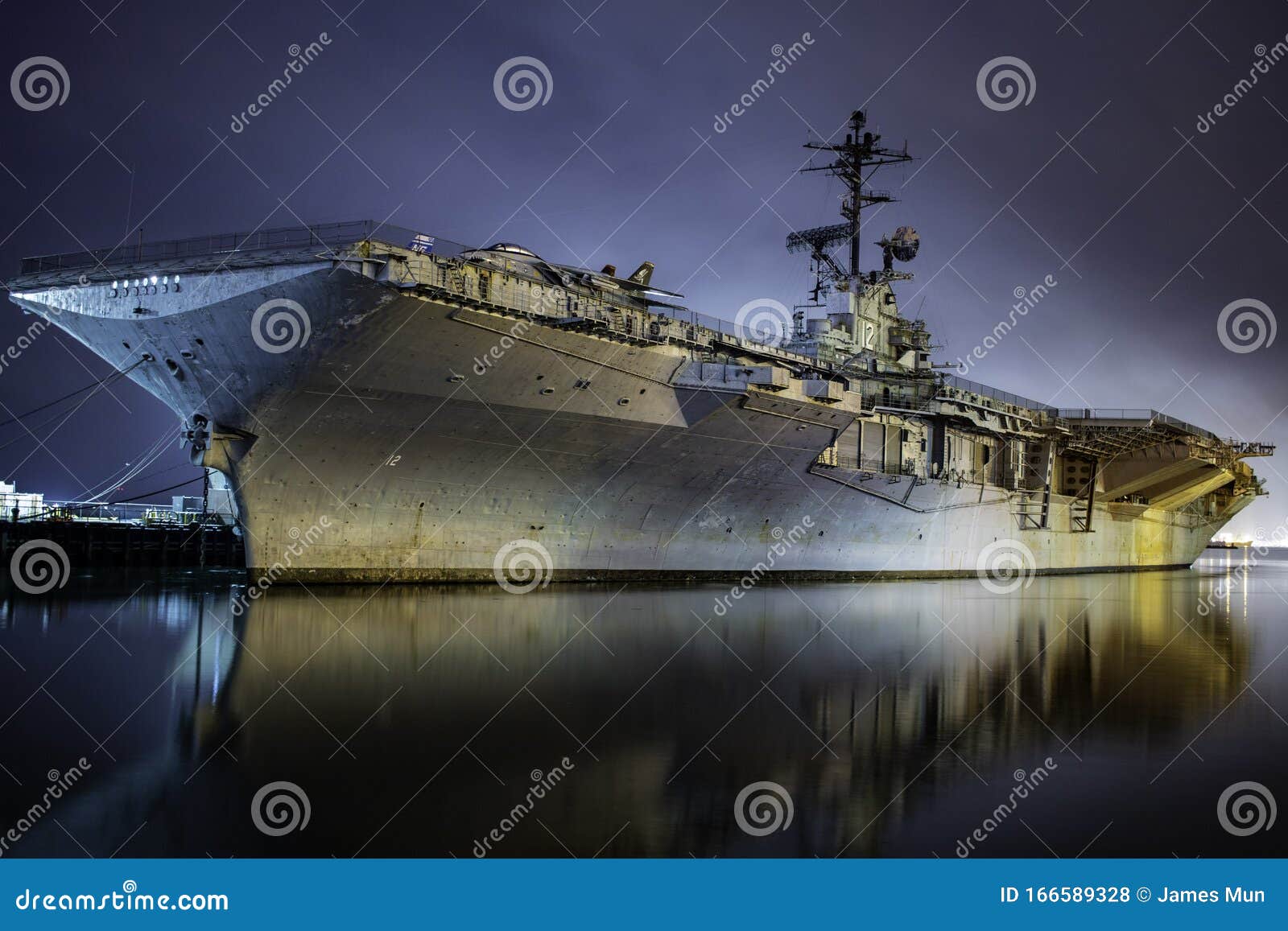Side View of an Aircraft Carrier at Night Stock Photo - Image of dark ...