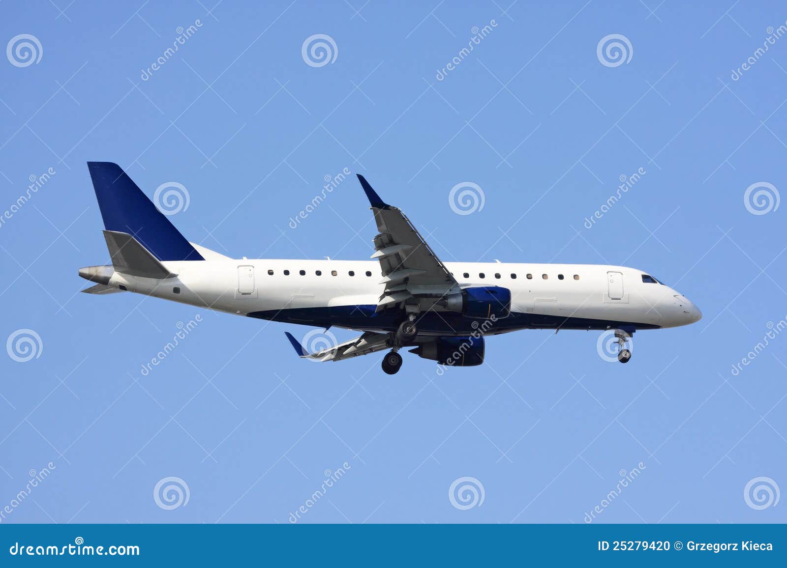 Side View of an Airliner Against Blue Sky Stock Photo - Image of wing ...