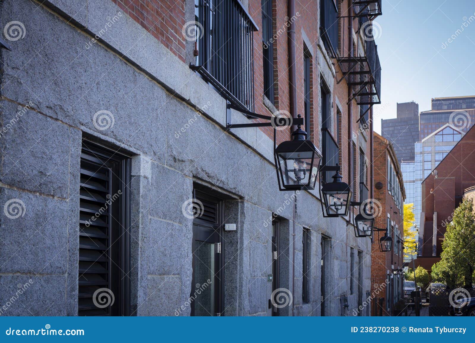 Side View of Apartment Building Facade with Hanging Lanterns. Stone and ...