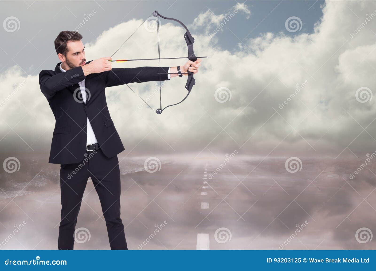 Side View of an Archer Shooting an Arrow Against Road Background Stock ...