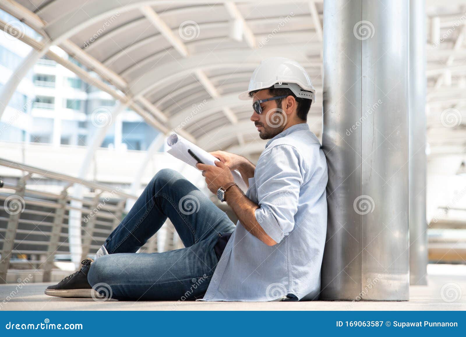 Side View of Architect Sitting on Walkway Bridge Stock Image - Image of ...